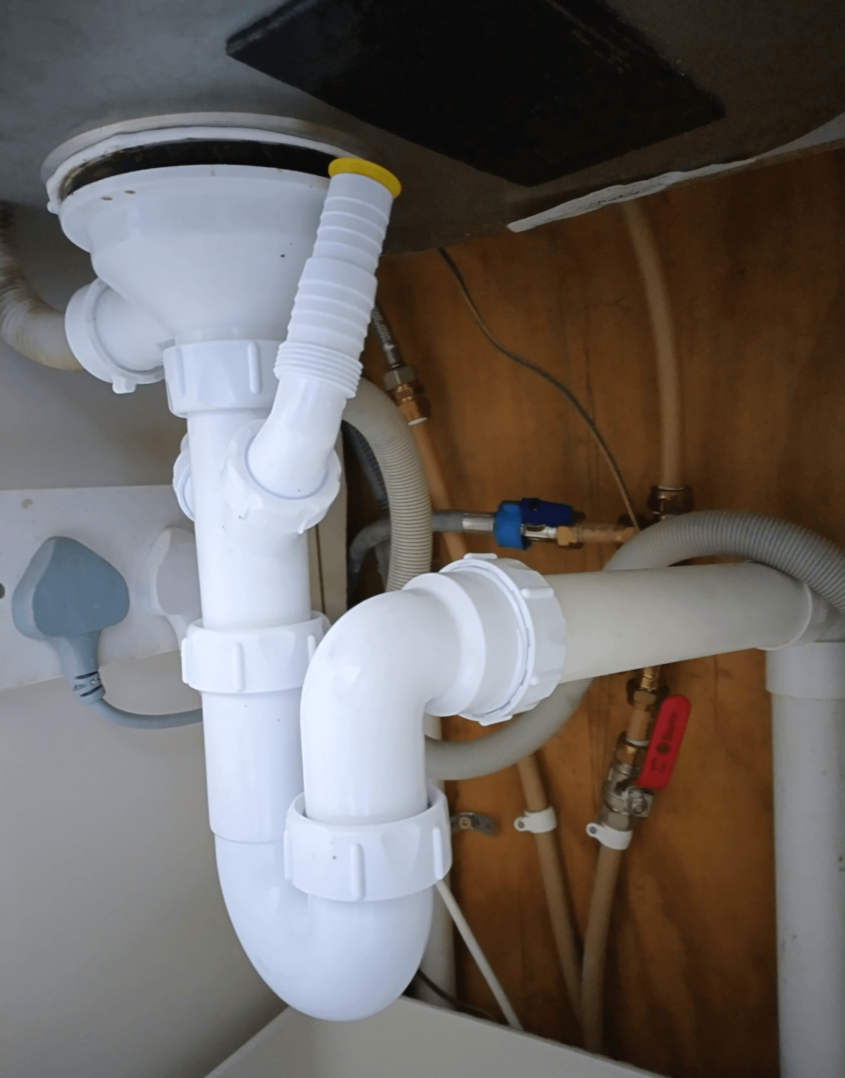 Dripping under Kitchen Sink: Quick Fixes and Prevention Tips - KitchenBucks