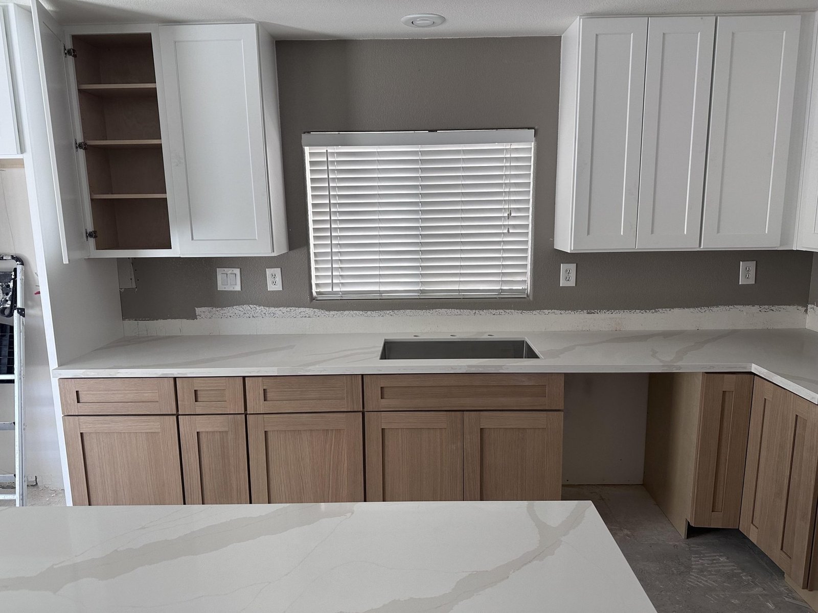Kitchen Sink Not Centered under Window: Design Solutions - KitchenBucks